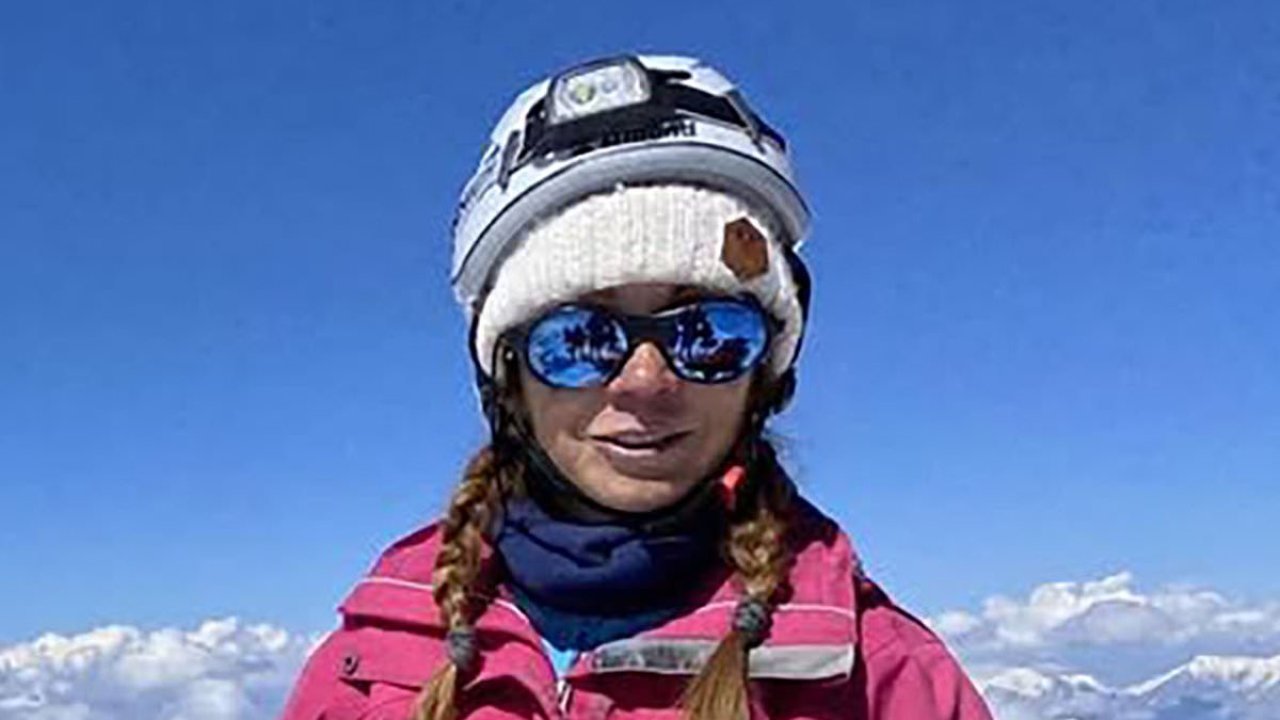 Bid to save woman stuck on mountain with broken leg is called off ...