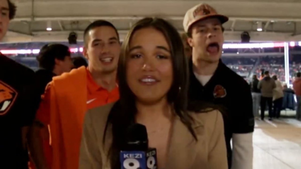 Female reporter praised for keeping calm while being accosted by fans ...