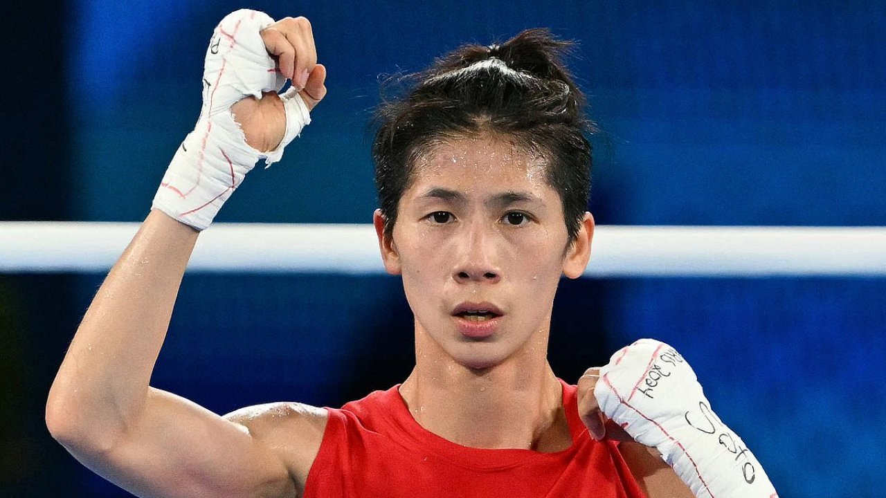 Olympic gender-row boxer knocks out opponent in 94 SECONDS on return ...