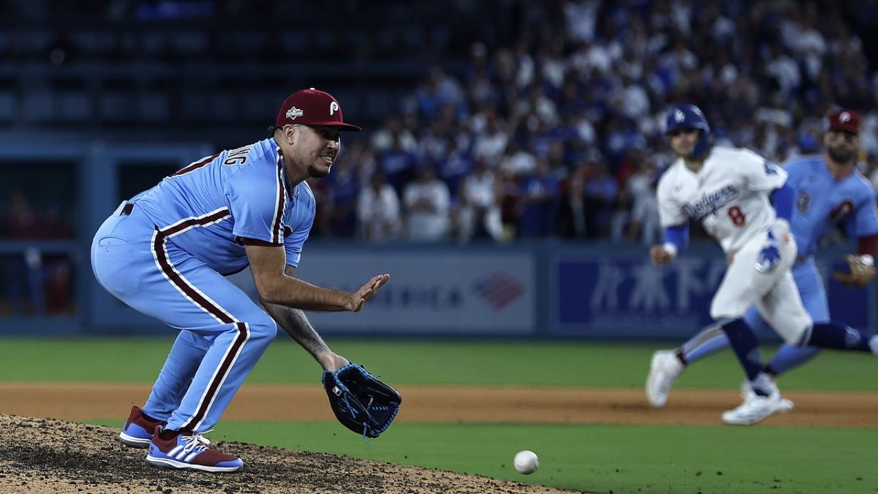 Phillies pitcher is consoled by teammates after season-ending error ...